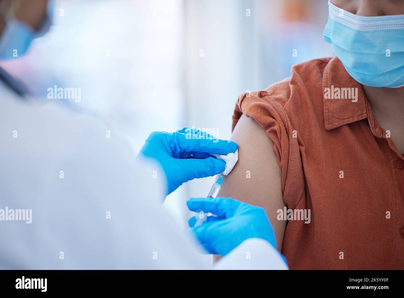 Doctor hands, vaccine or covid injection in arm for global virus ...