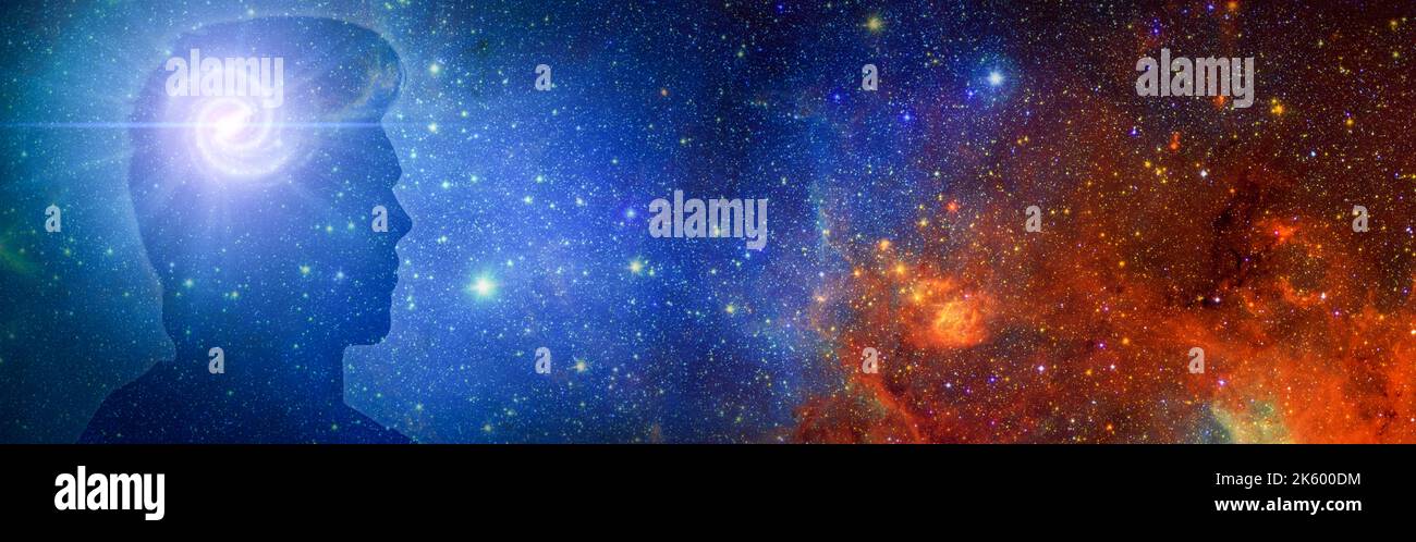 silhouette of virtual human with aura chakras on space. Universe within ...