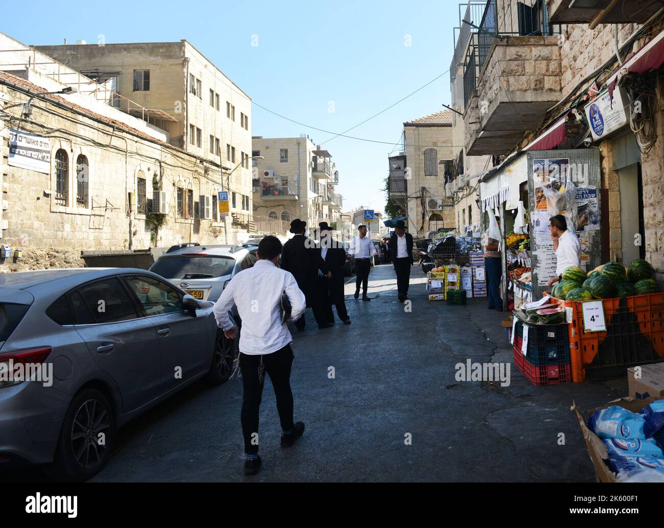 Pedestrians crossing the road at the ultra-Orthodox neighborhood of ...