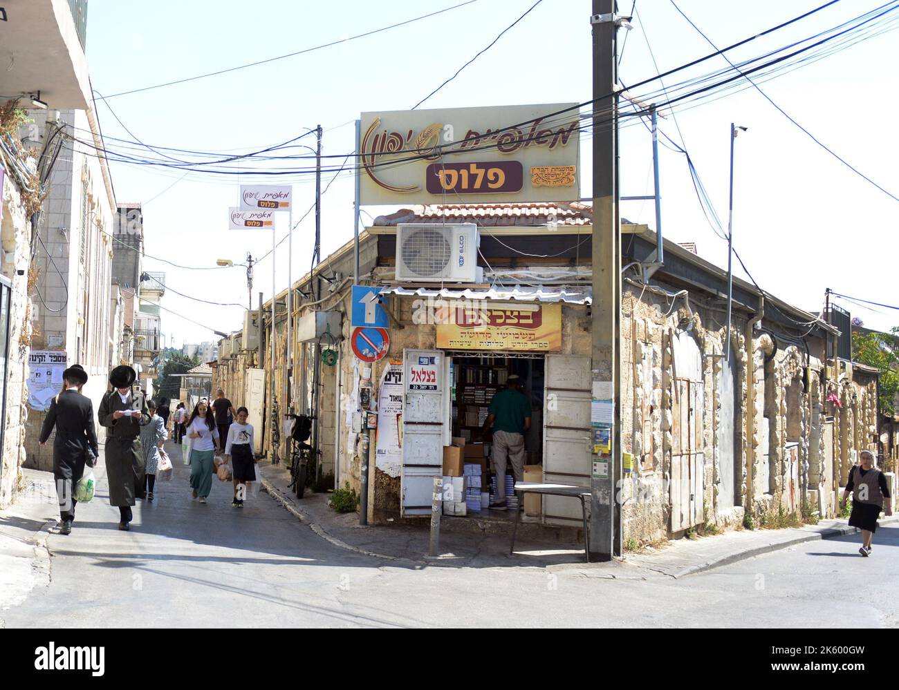 Pedestrians crossing the road at the ultra-Orthodox neighborhood of ...