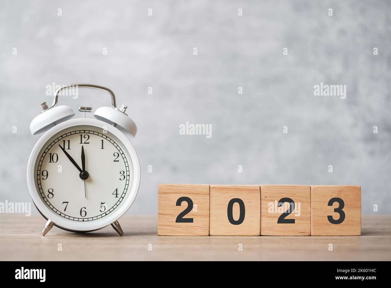 Happy New Year with vintage alarm clock and 2023 block. Christmas, New ...