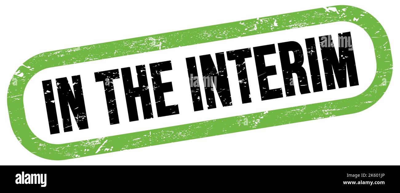 IN THE INTERIM, text on green-black rectangle stamp sign Stock Photo ...