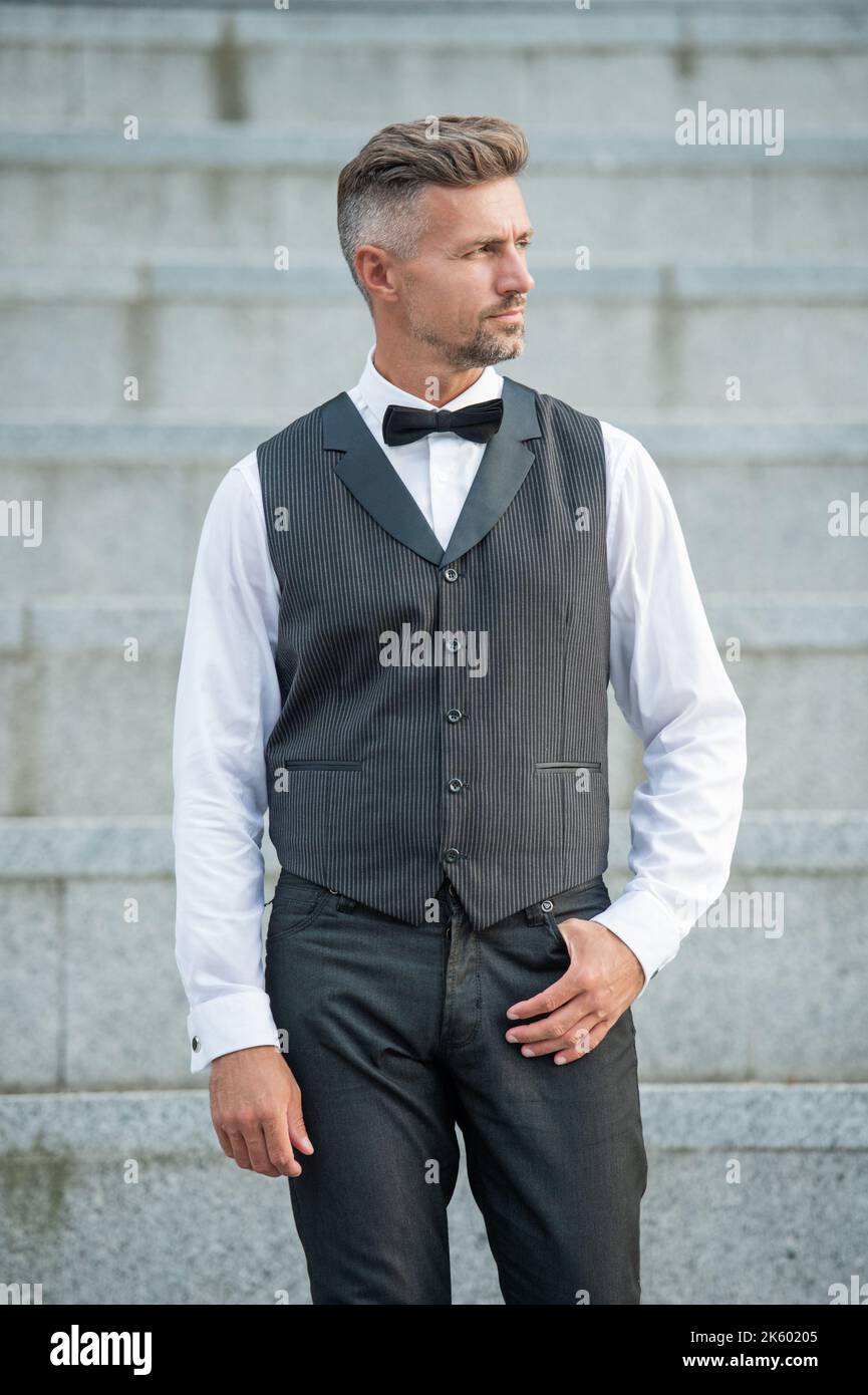 elegant man in bowtie. grizzled man in formalwear. tux man bridegroom ...
