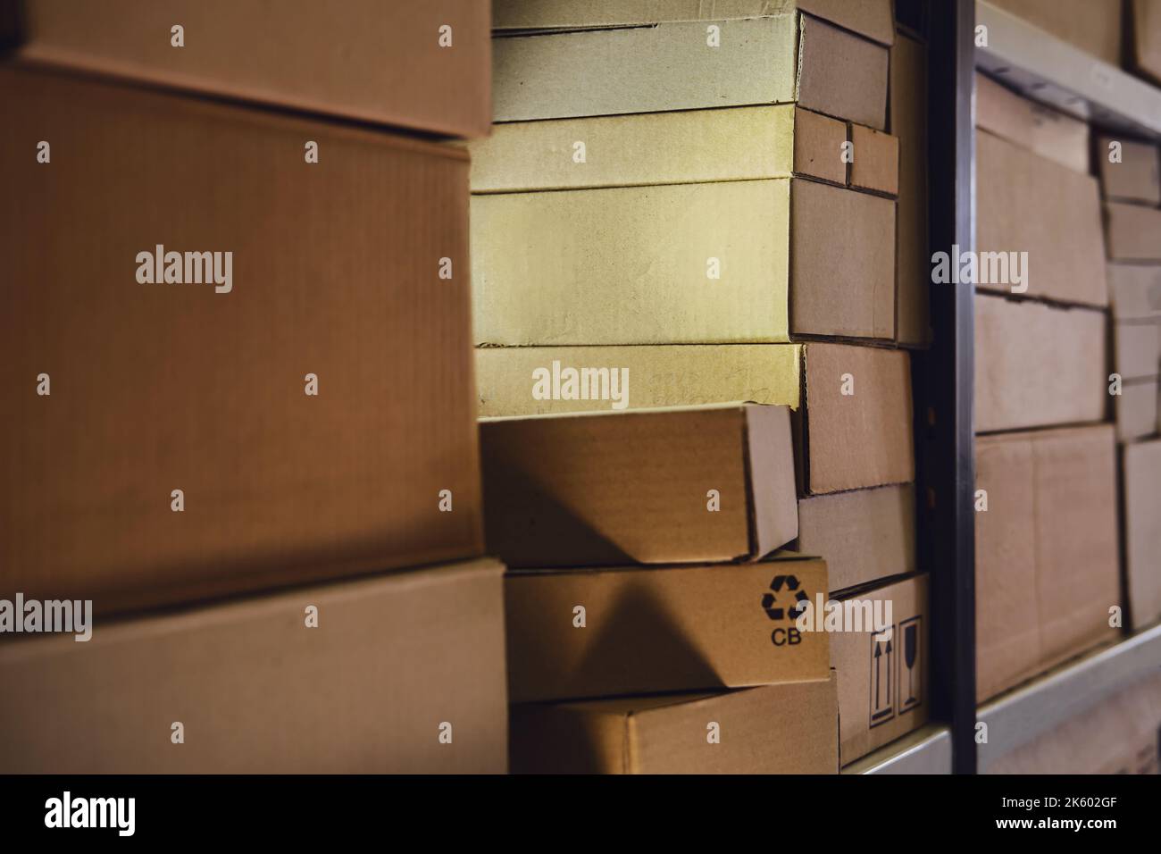 Cardboard boxes on the shelves of warehouse shelves, close-up Stock ...