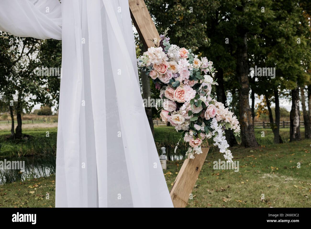 wedding arch decorated with flowers. Beautiful wedding set up Stock ...