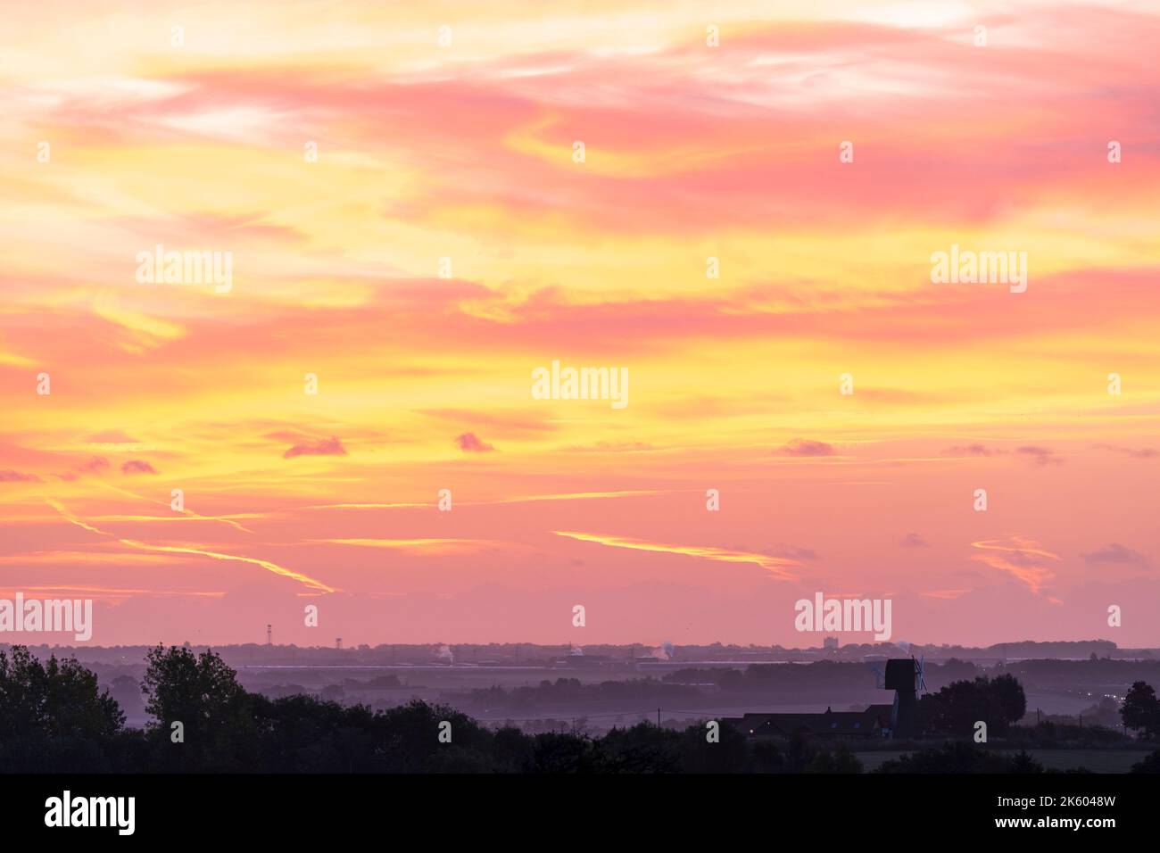 The dawn sky over the Kent landscape looking towards the Isle of Thanet ...