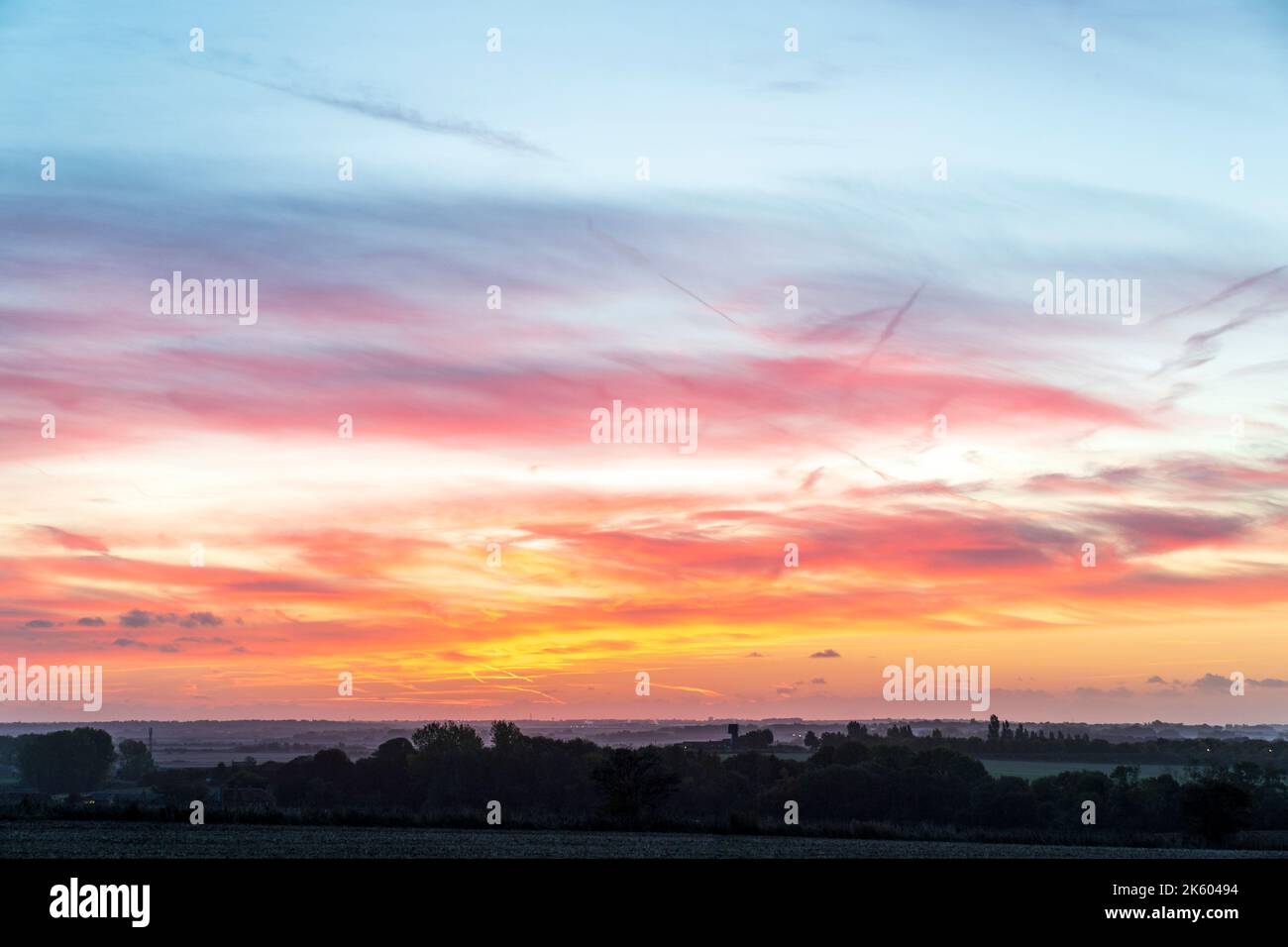 The dawn sky over the Kent landscape looking towards the Isle of Thanet ...