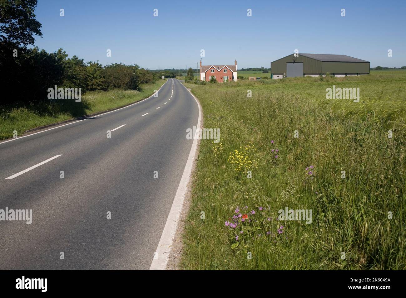 The A1071 road and a farm near Sproughton to the West of Ipswich in ...
