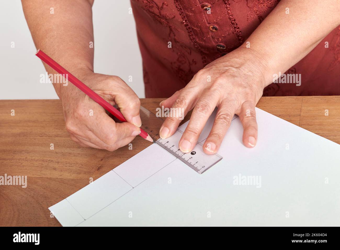 Woman with ruler hi-res stock photography and images - Alamy