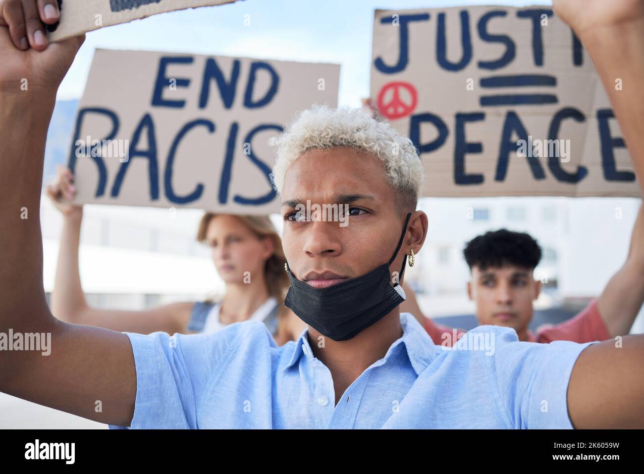 Man, crowd and protest for peace, racism and justice in street with ...