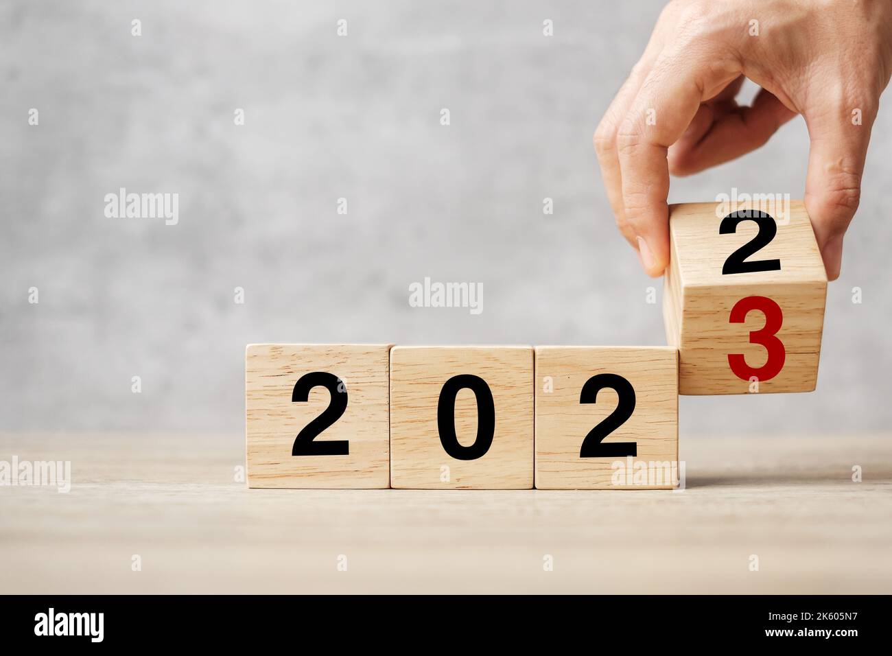 hand flipping block 2022 to 2023 text on table. Resolution, strategy ...