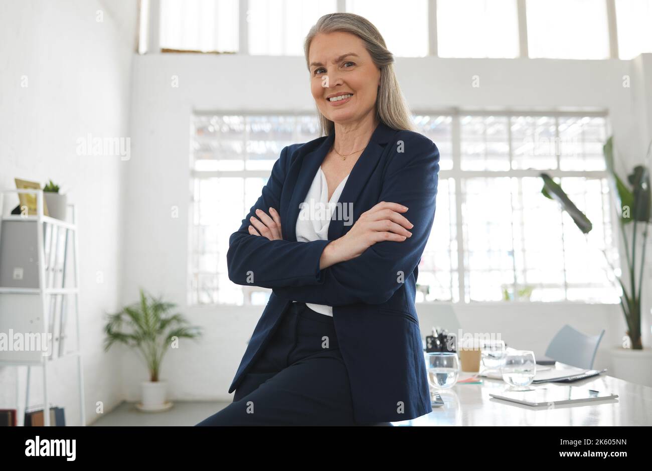 Smiling mature female manager hi-res stock photography and images - Alamy