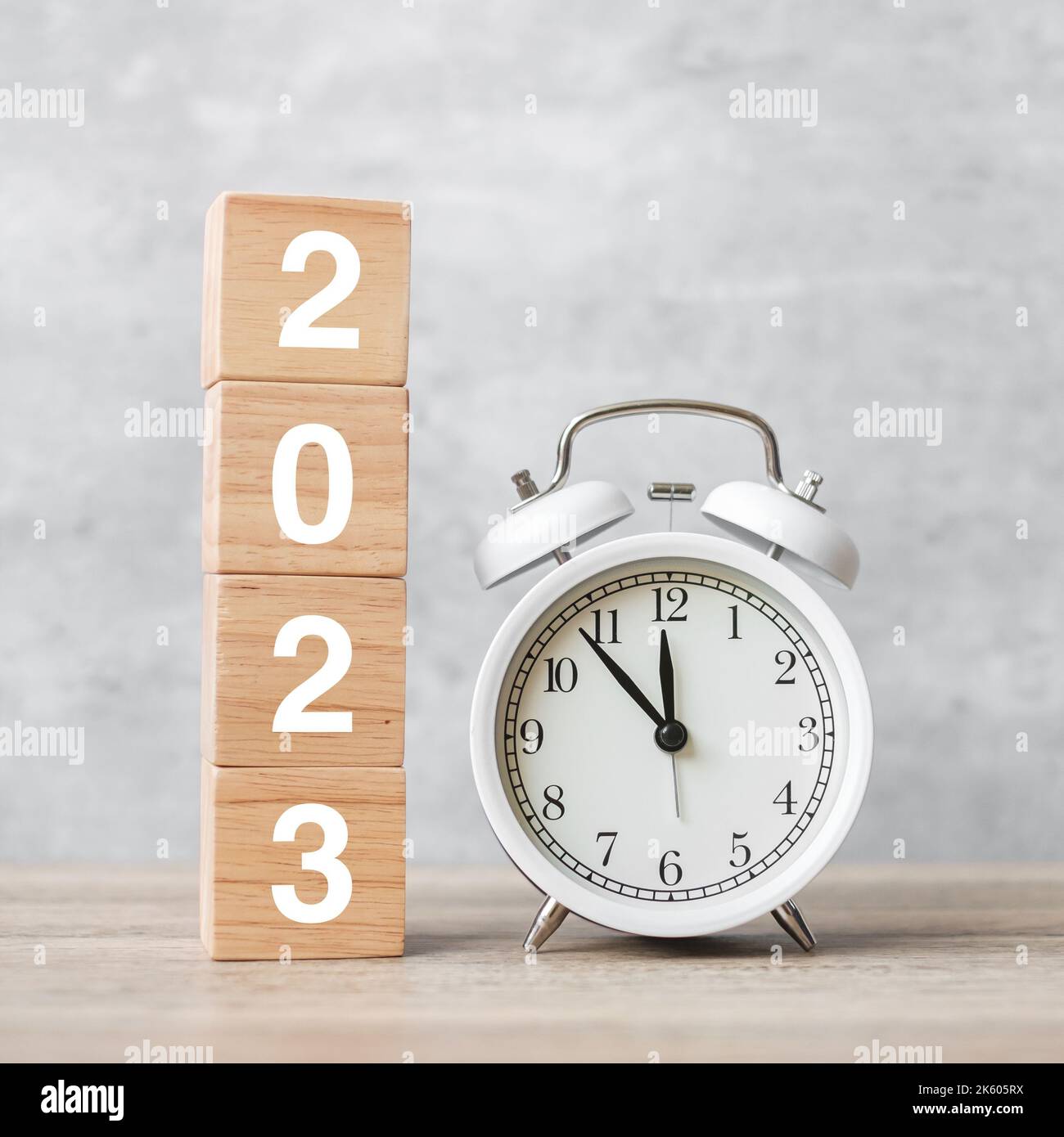 Happy New Year with vintage alarm clock and 2023 block. Christmas, New ...