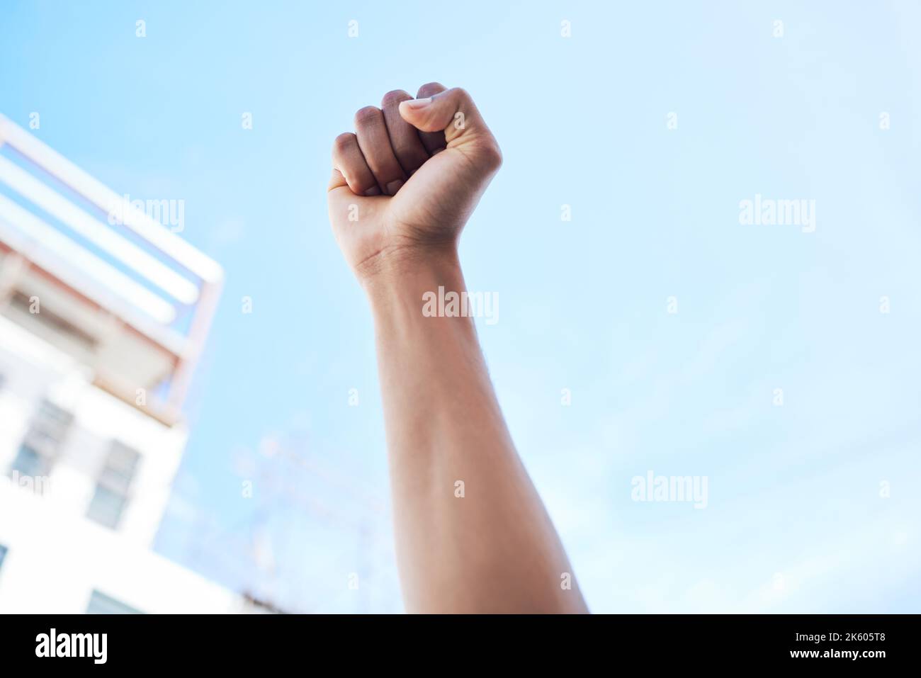 Fist hands, in air for protest rally and justice with solidarity with ...