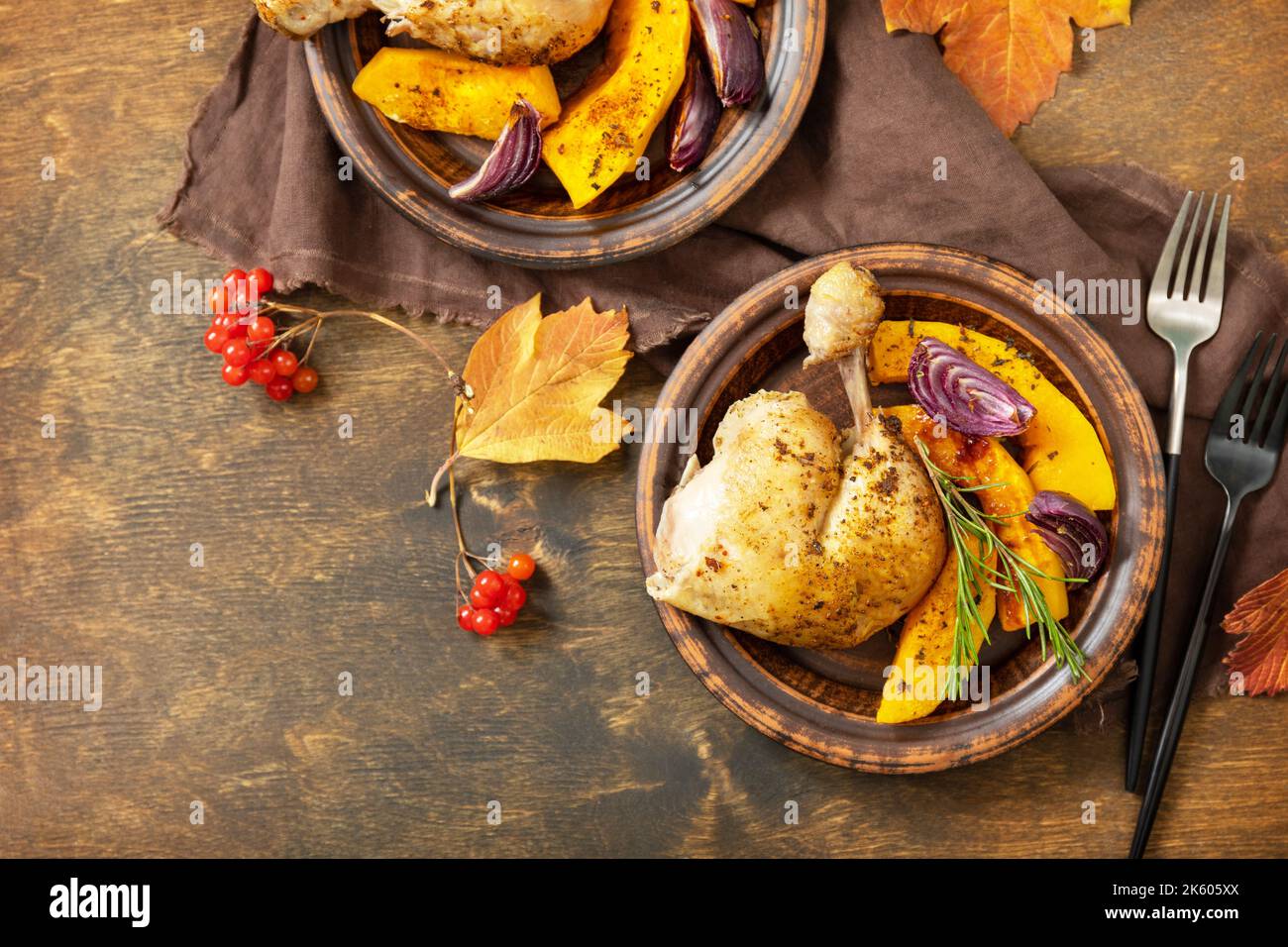 Homemade Thanksgiving dinner ripe pumpkin and Thanksgiving turkey on a ...