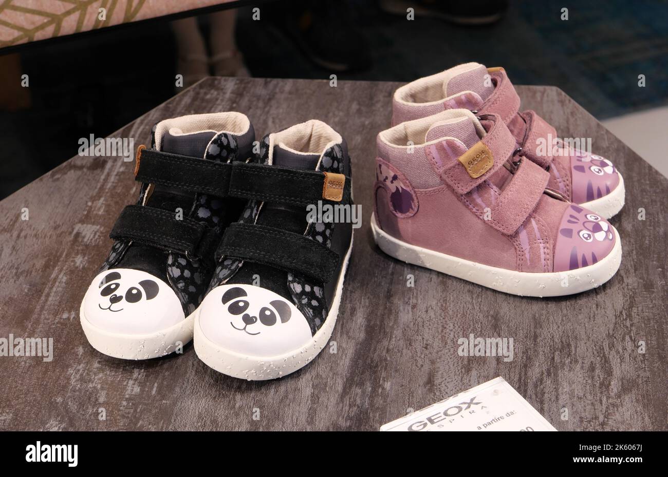 CHILDREN'S SHOES ON DISPLAY AT GEOX FASHION BOUTIQUE Stock Photo - Alamy