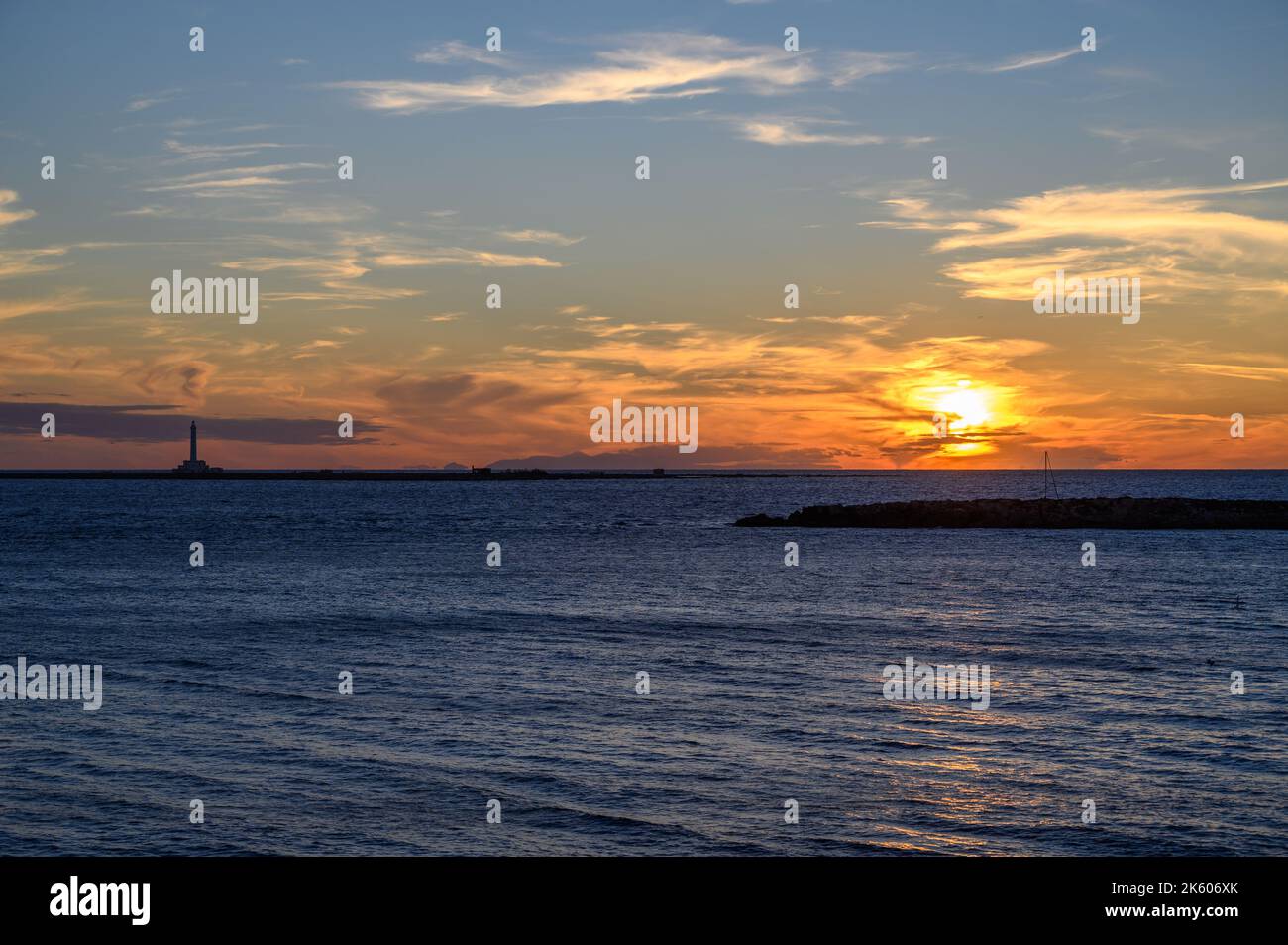 Isola Sant'Andrea Lighthouse seen on the horizon in the Ionian Sea next ...