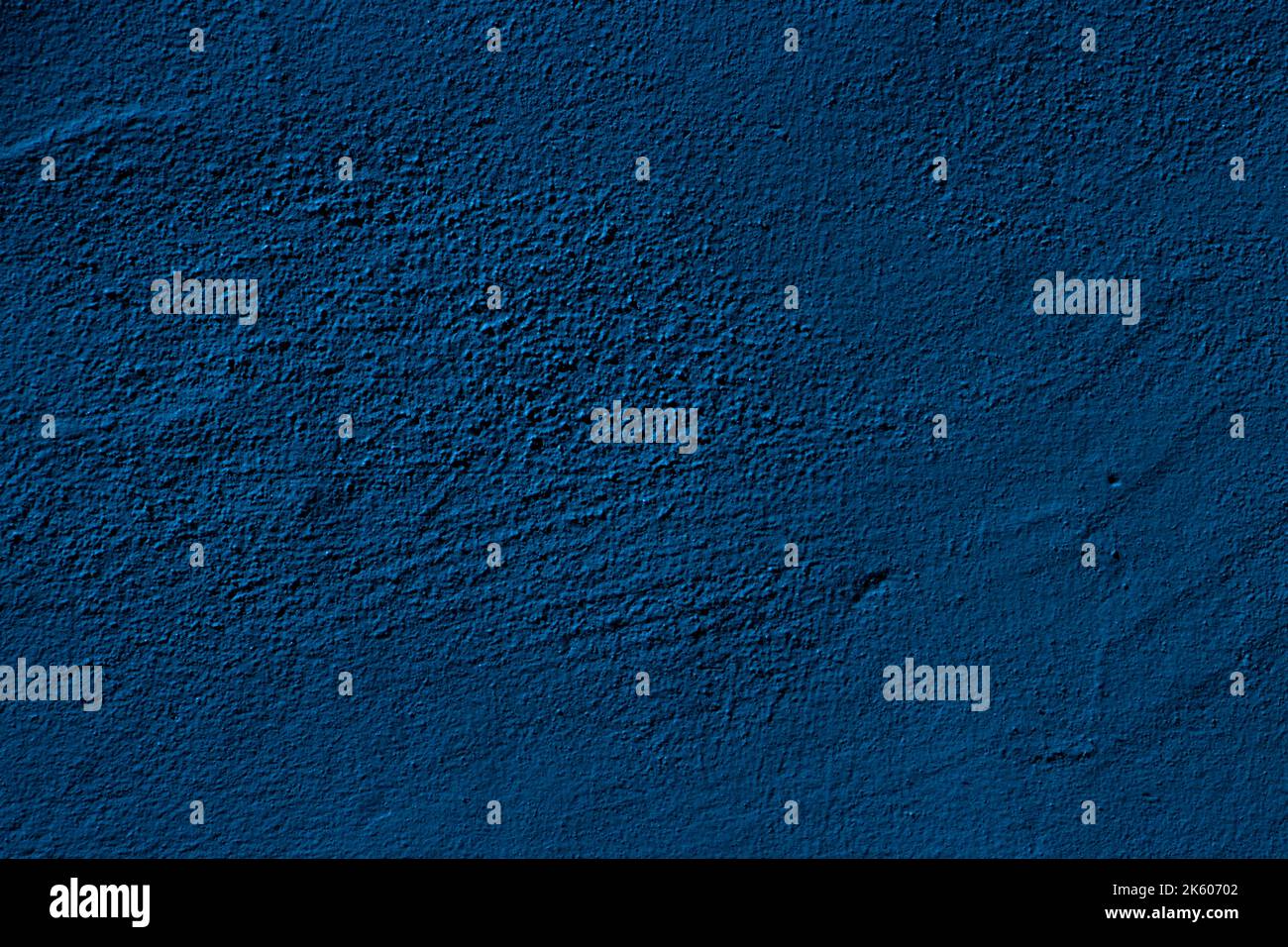 Blue colored abstract wall background with textures of different shades ...