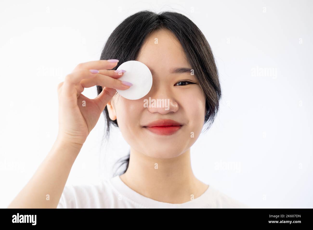 Asian skin care. Happy woman. Cleansing treatment. Moisturizing ...