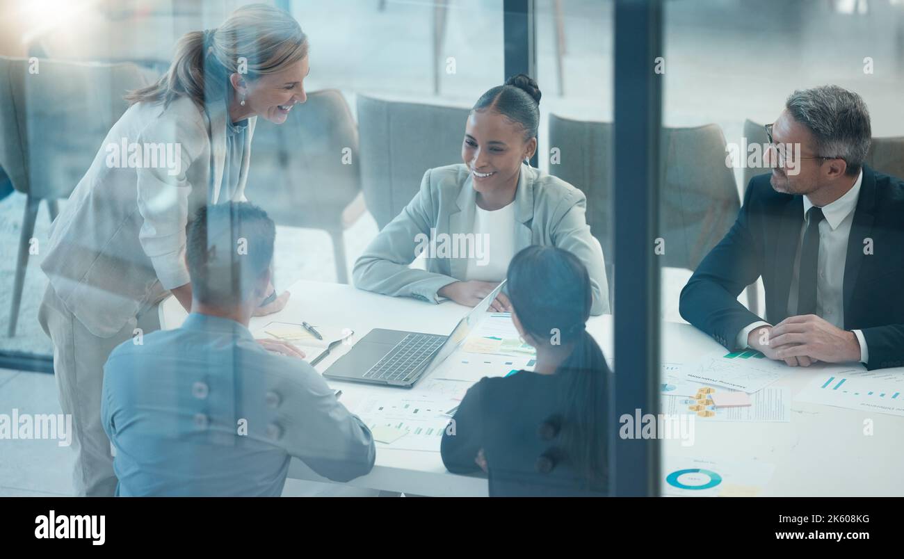 Leader, meeting and presentation with business people behind glass in a ...