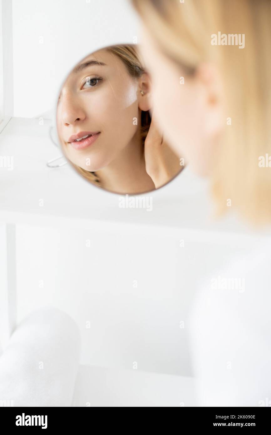 morning cosmetology facial skincare woman mirror Stock Photo - Alamy