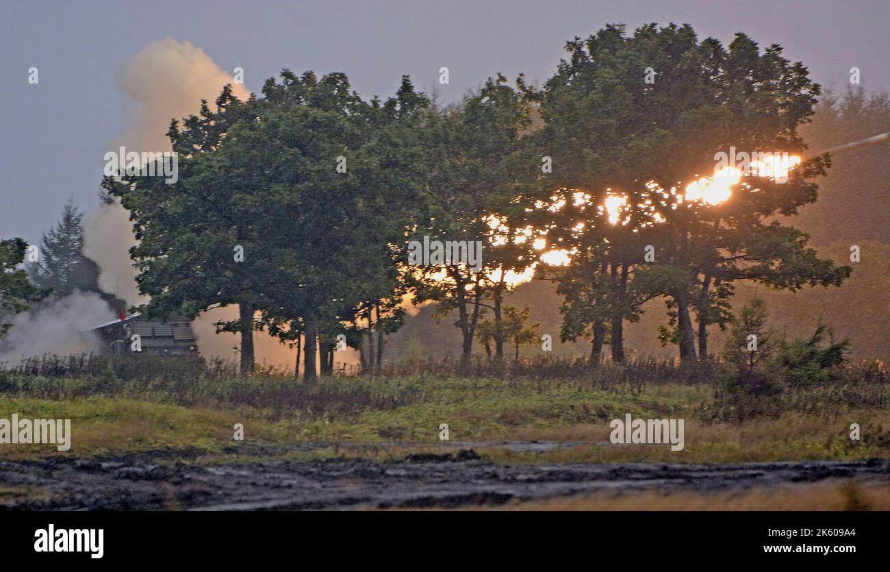 The Japan Ground Self-Defense Force conducts an artillery live-fire ...