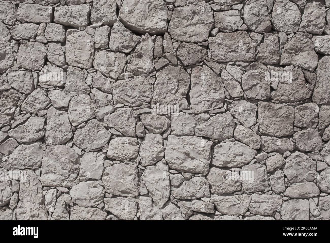 Wall closeup hand construction stones texture Stock Photo - Alamy