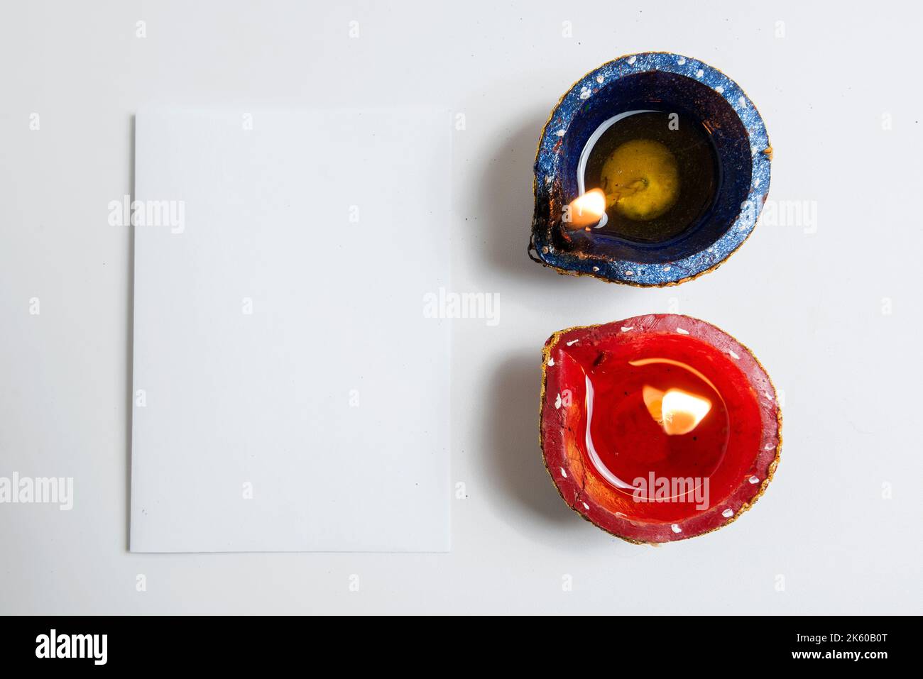 Diya oil lamps for the Diwali festival with empty paper for copy space ...