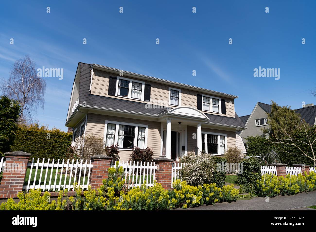 Cottage house on blue sky. Suburb architecture. Suburban housing Stock ...