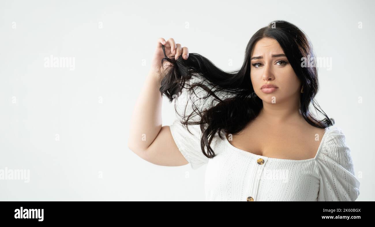 unhealthy hair upset woman bad treatment split Stock Photo - Alamy