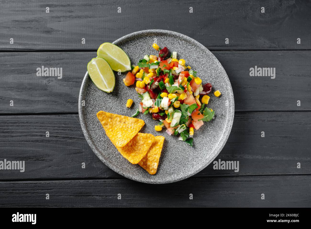 Texas caviar on a black wooden background. Top view. Texas dish with ...