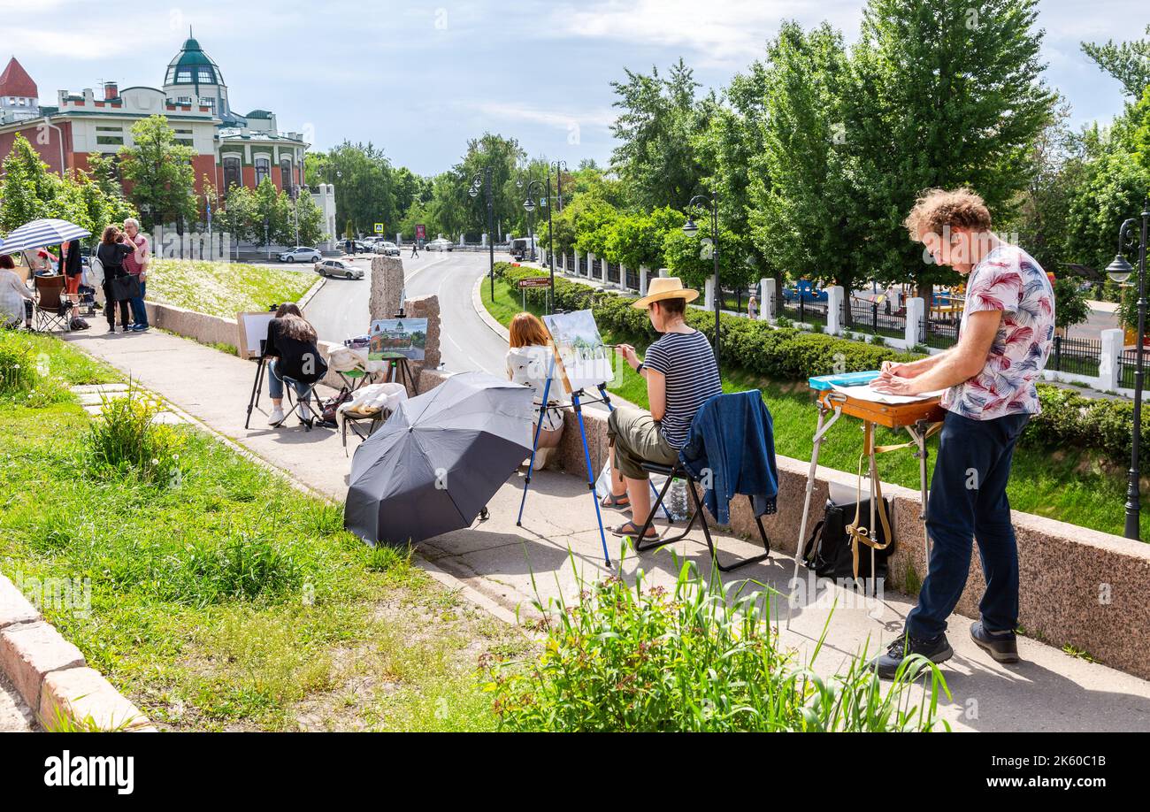 Samara, Russia - June 4, 2022: Artists paint drawing cityscape at the ...