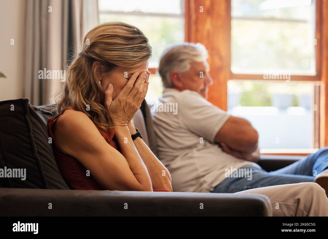 Crying, divorce and fight with a senior woman sad in her home after an ...