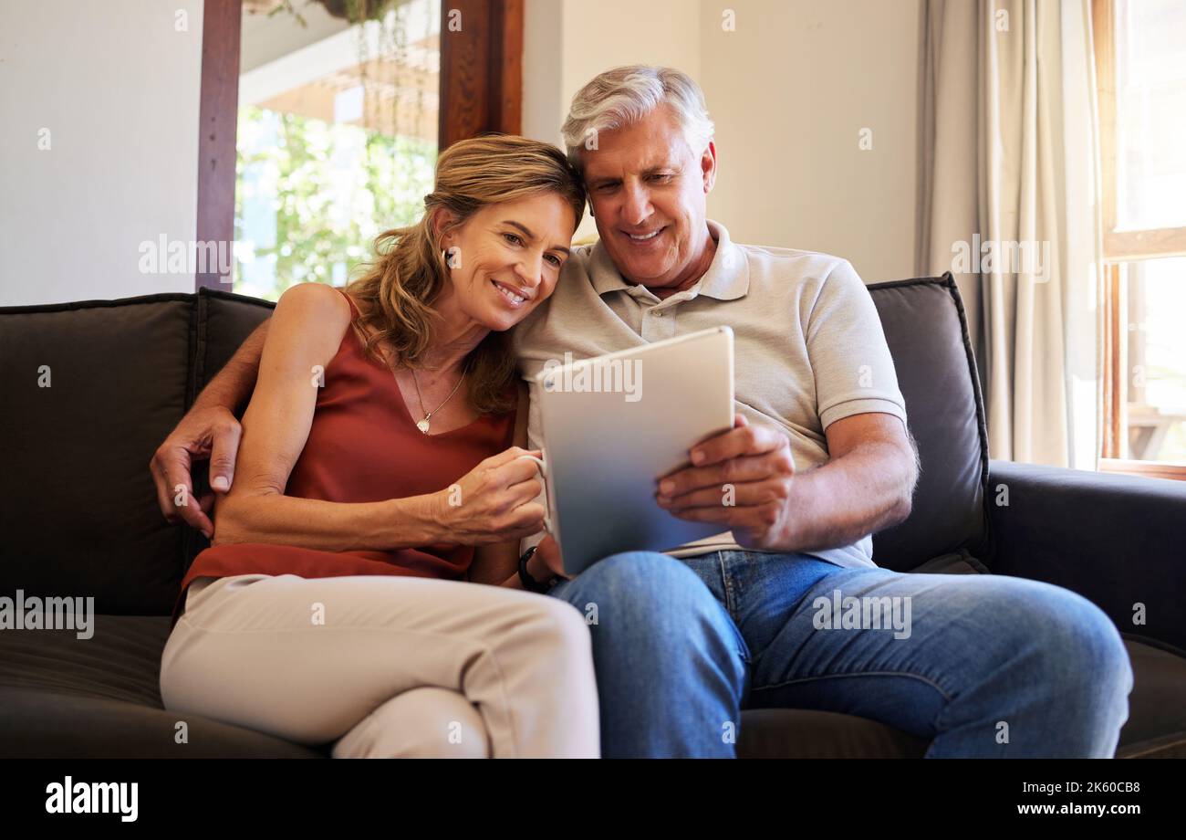 Tablet, movie and senior couple streaming a film on the internet from ...