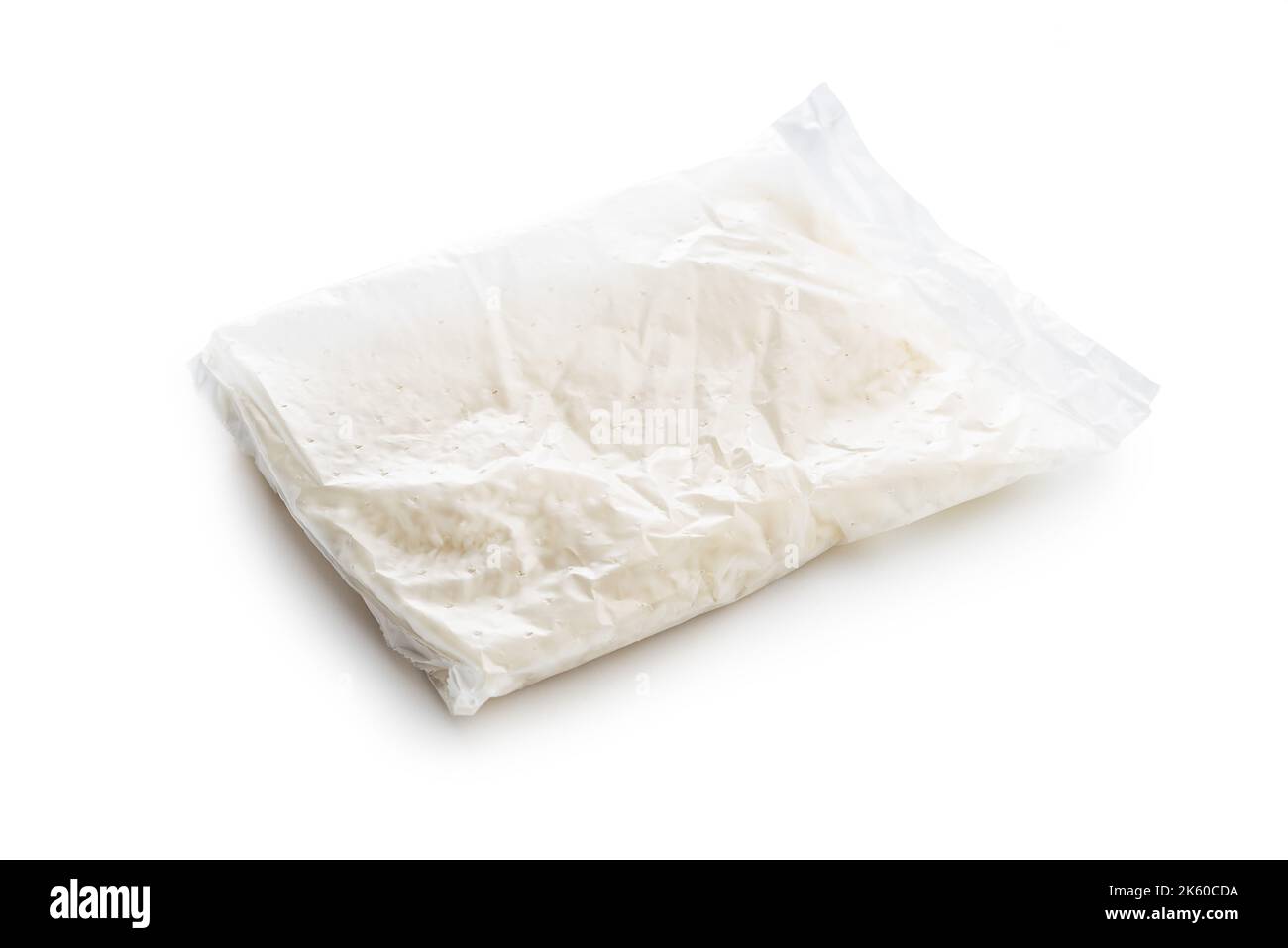 Uncooked rice in the cooking sack isolated on white background Stock ...