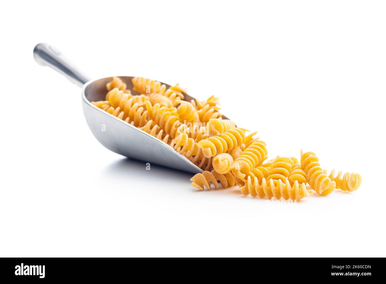 Uncooked whole grain pasta isolated on white background. Raw pasta in ...