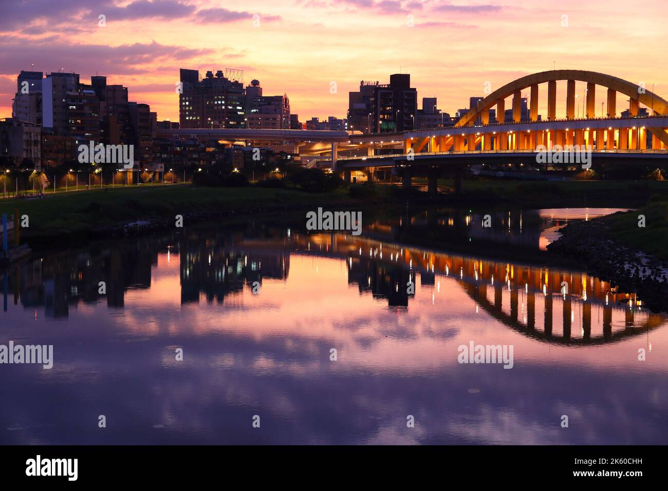 Songshan district sunset cityscape in Taipei. River skyline reflection ...