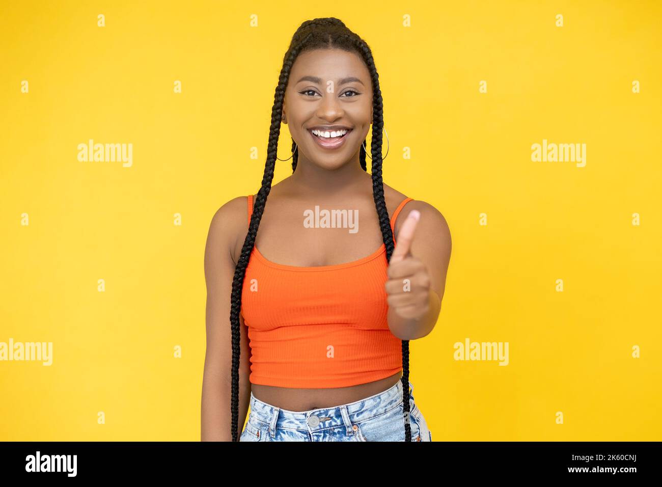 approval gesture agree sign african woman thumb up Stock Photo - Alamy