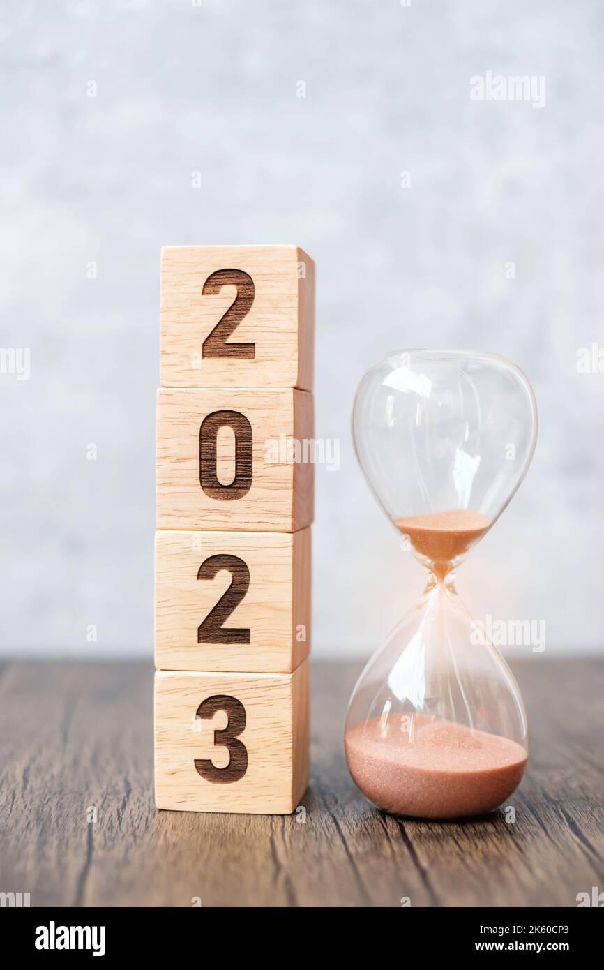 2023 block with hourglass on table. Resolution, time, plan, goal ...
