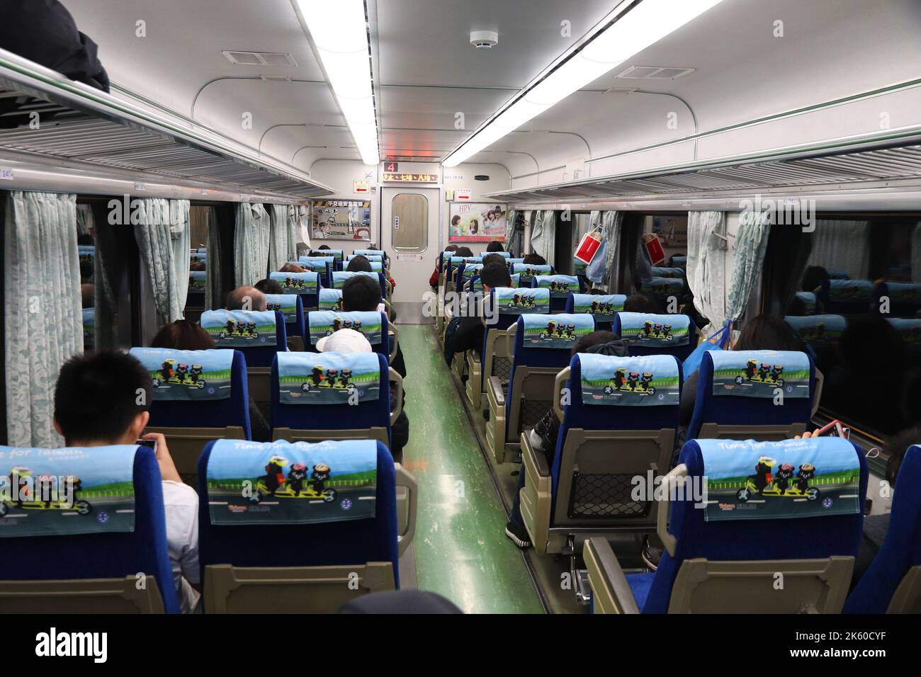 KEELUNG, TAIWAN - NOVEMBER 22, 2018: People ride a Taiwan Railways (TRA ...