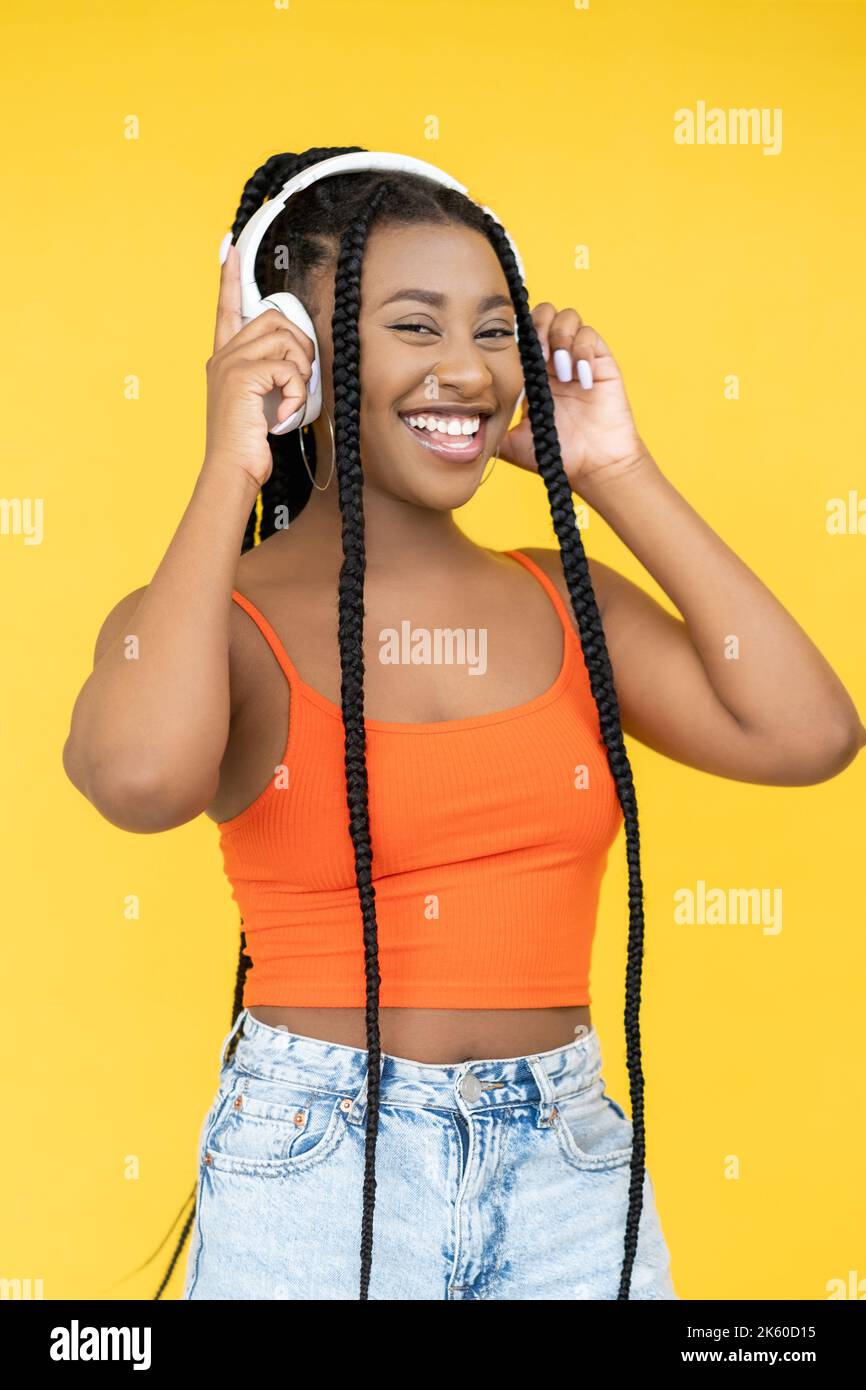 Young woman listening favorite music hi-res stock photography and images - Alamy