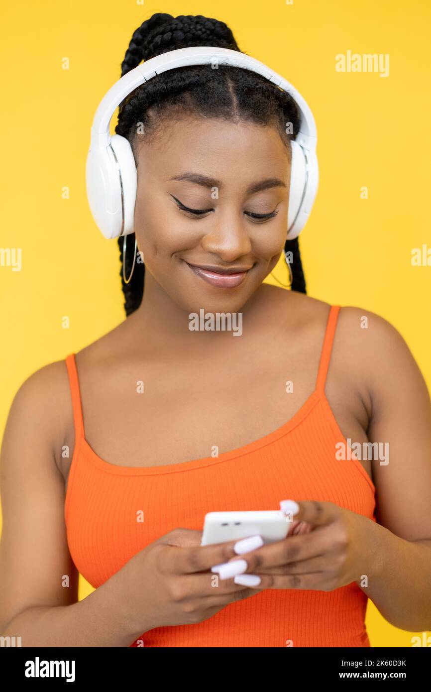mobile music playlist app woman headset phone Stock Photo - Alamy