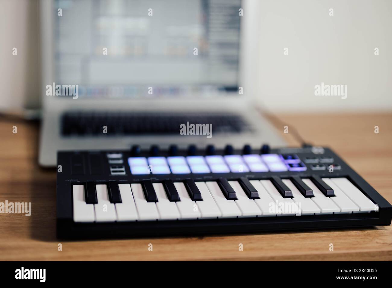 Midi Keyboard musician playing midi keyboard for arranging music on ...