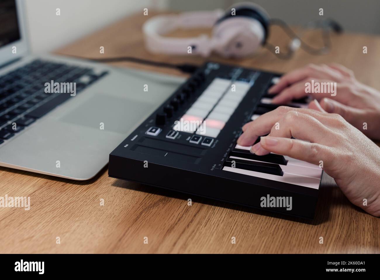 Midi Keyboard musician playing midi keyboard for arranging music on ...