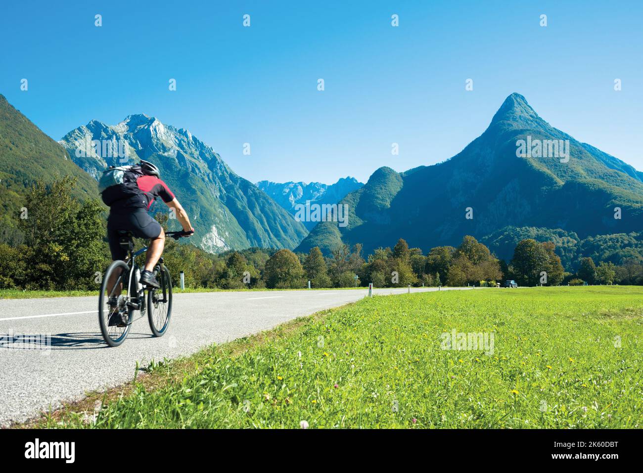Mountain bike rider in Alps Stock Photo - Alamy