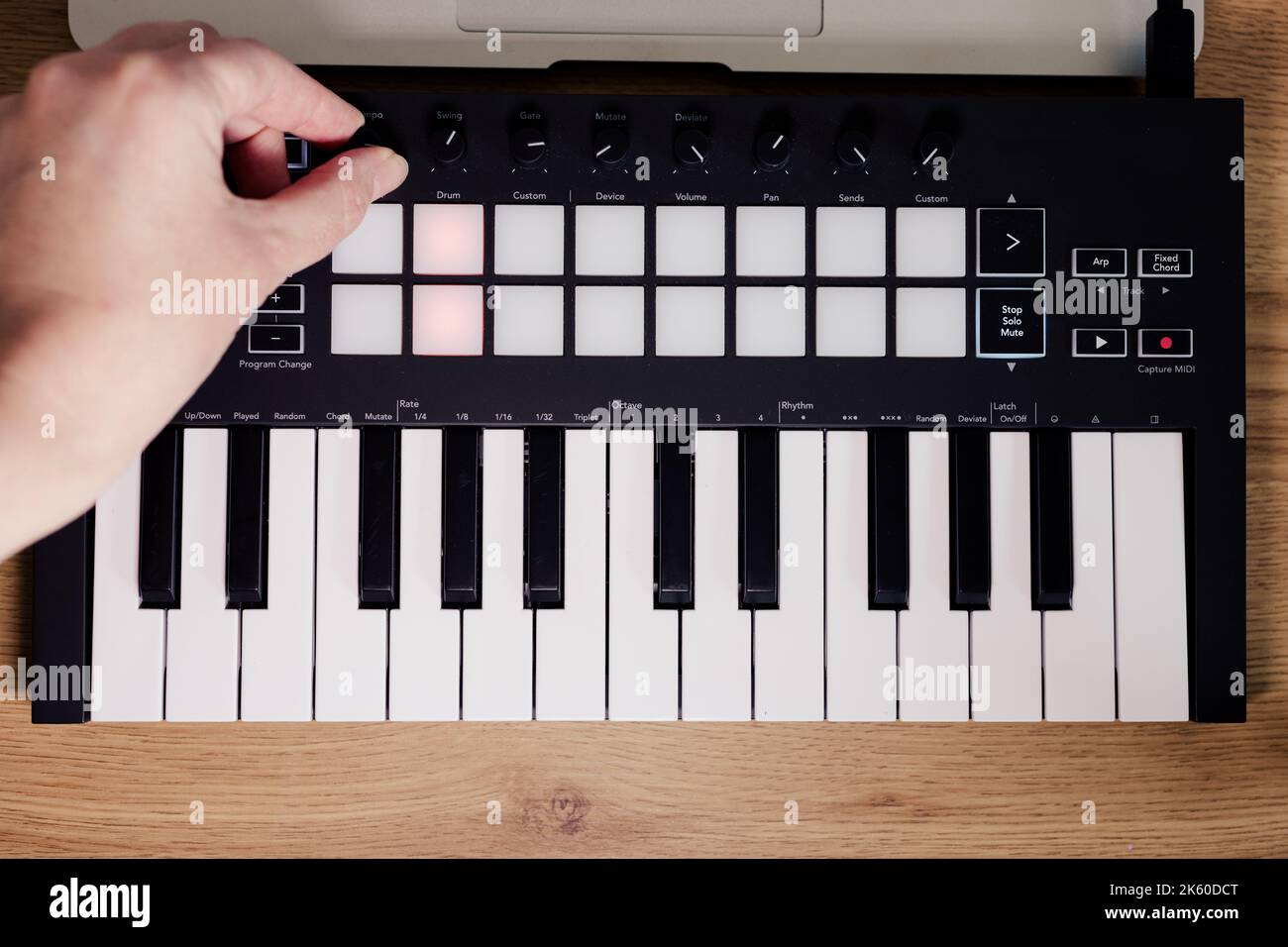 Midi Keyboard musician playing midi keyboard for arranging music on ...