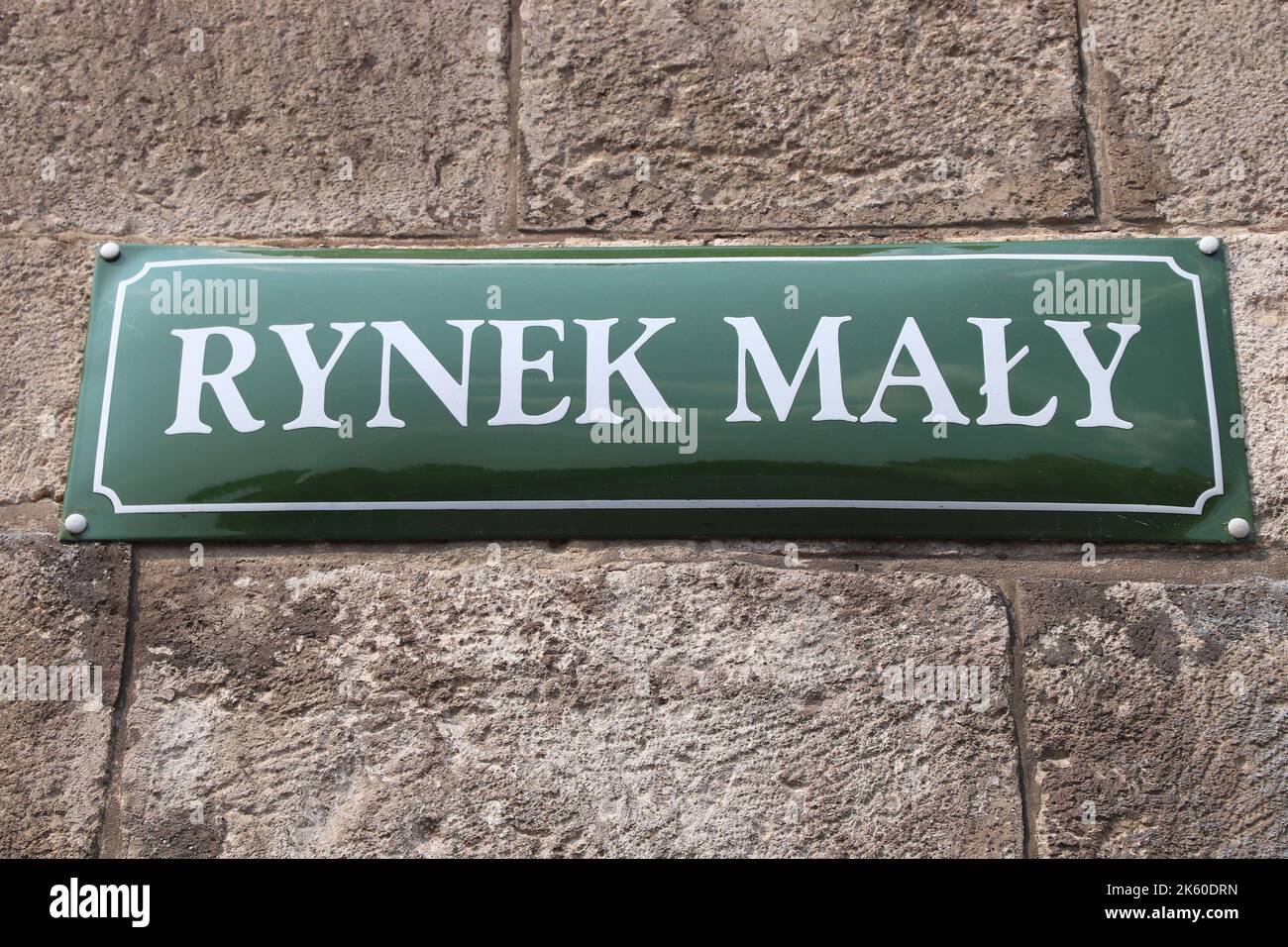 Krakow Old Town in Poland. Square name sign: Rynek Maly square Stock ...