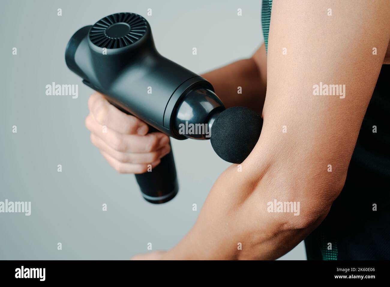 closeup of a young caucasian man, wearing sports clothes, using a ...
