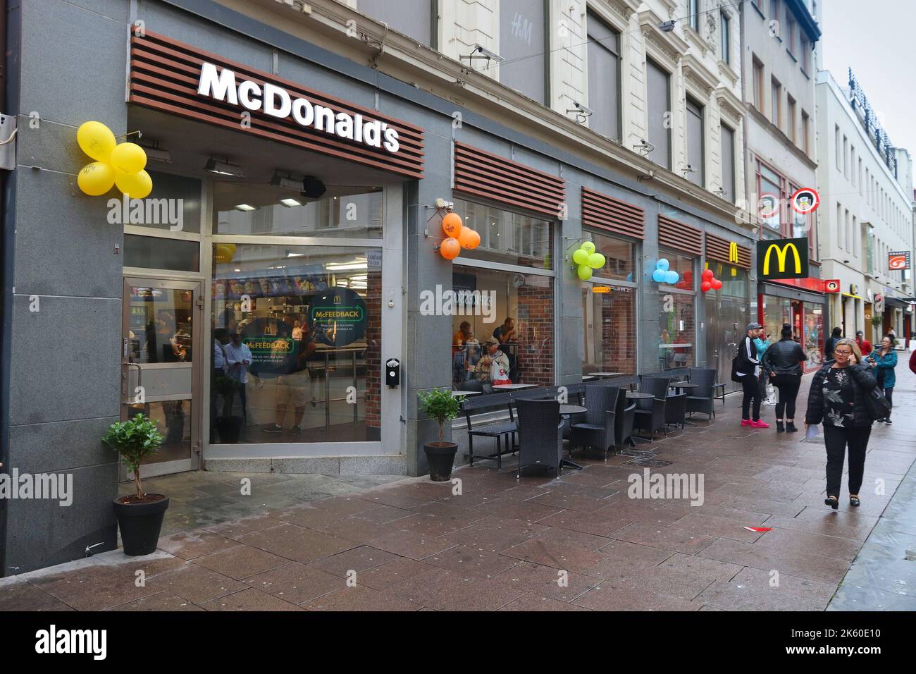 GOTHENBURG, SWEDEN - AUGUST 27, 2018: People walk by McDonald's fast ...
