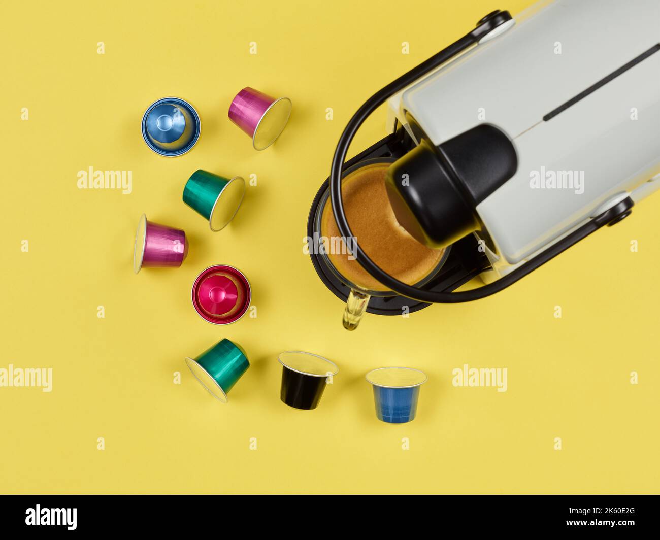 Capsule coffee machine and coffee capsules of different colors Stock ...